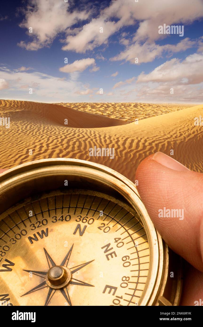 old compass in the sand dunes of the Sahara Stock Photo - Alamy