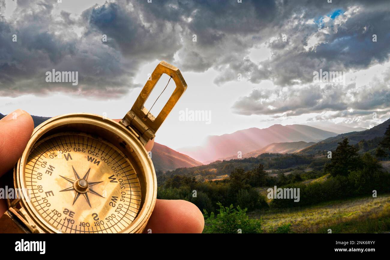 Old compass in the mountain Stock Photo - Alamy