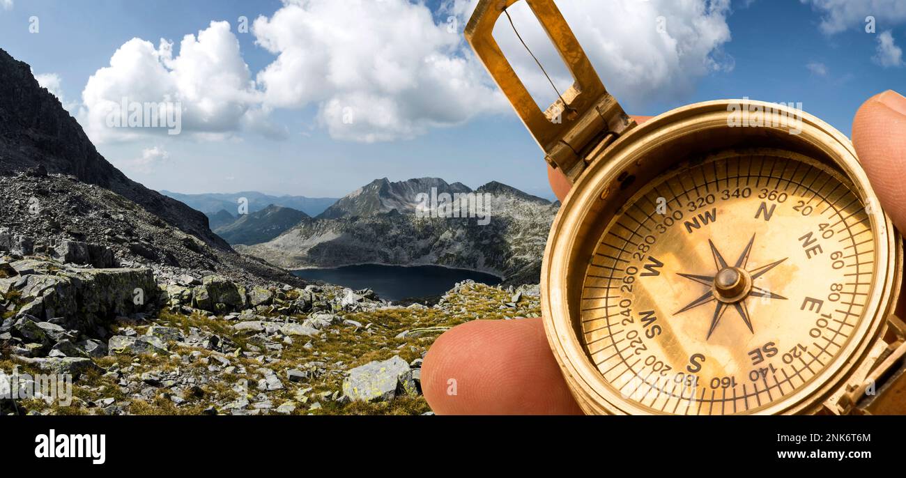 Old compass in the mountain Stock Photo - Alamy
