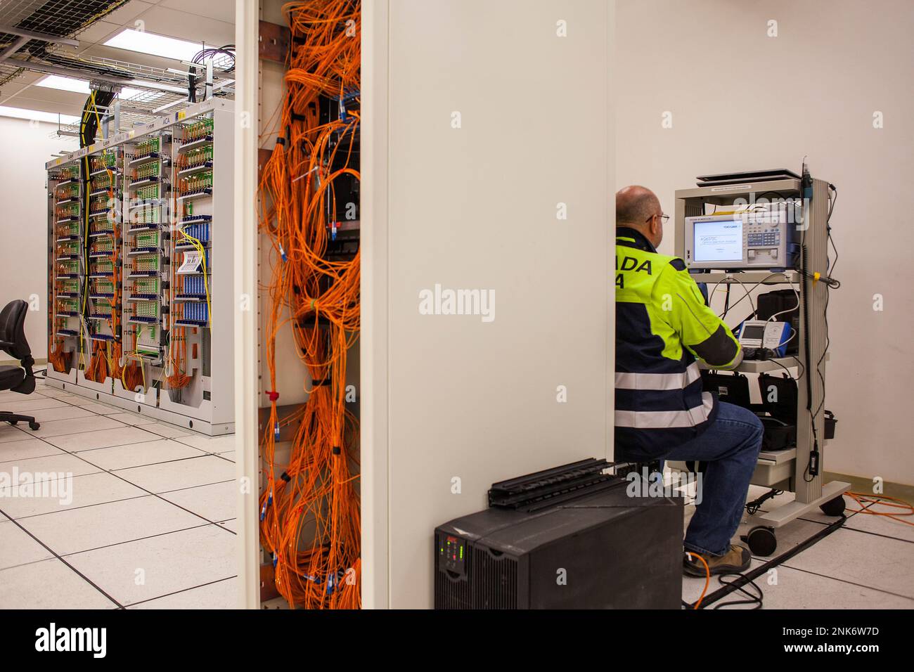 Alma Observatory Operator Working Correlator Large Computer In Technical Building On Plain