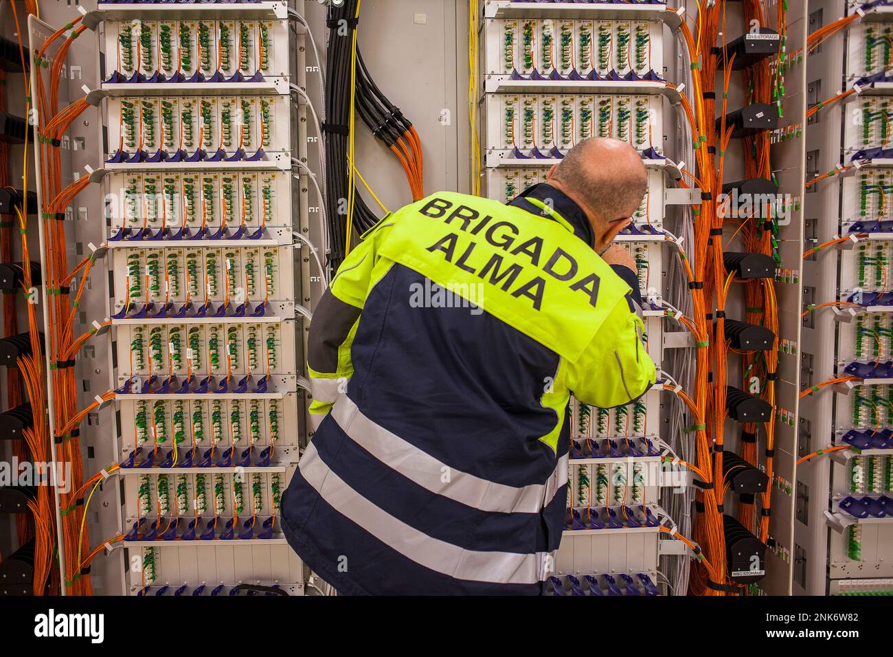 Alma Observatory Operator Working Correlator Large Computer In Technical Building On Plain