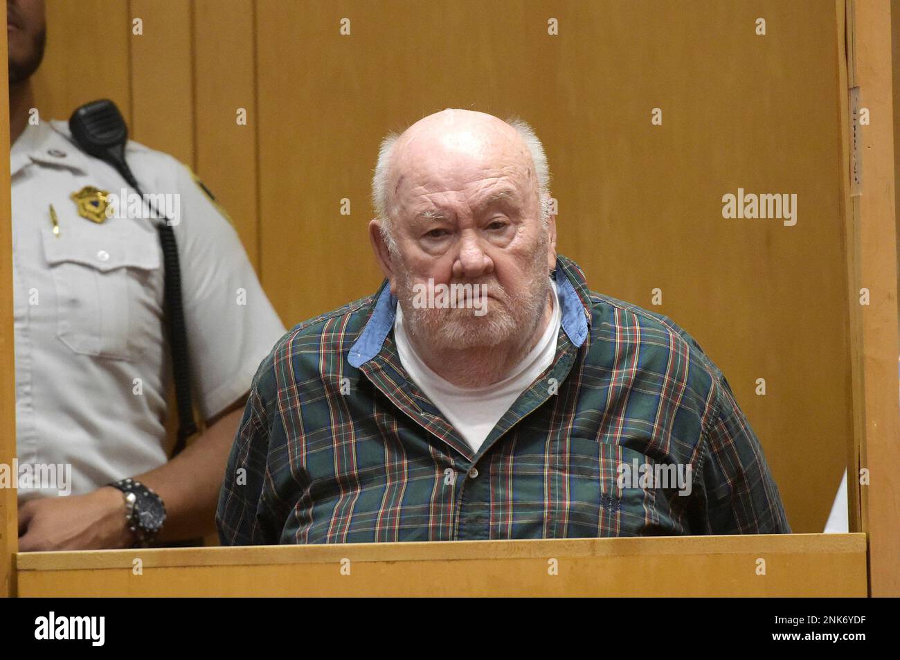 Marvin C. McClendon Jr. stands in the prisoner's dock during his ...