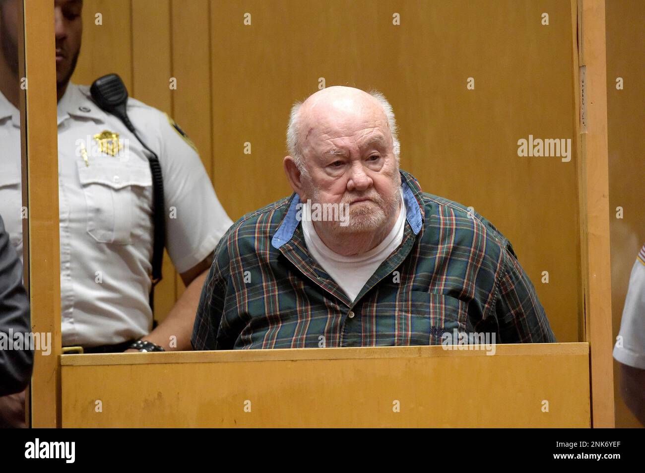 Marvin C. McClendon Jr. stands in the prisoner's dock during his ...