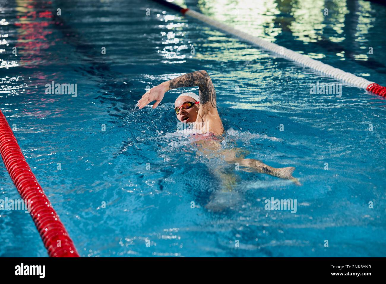 Front crawl swimming type. Professional female athlete training ...