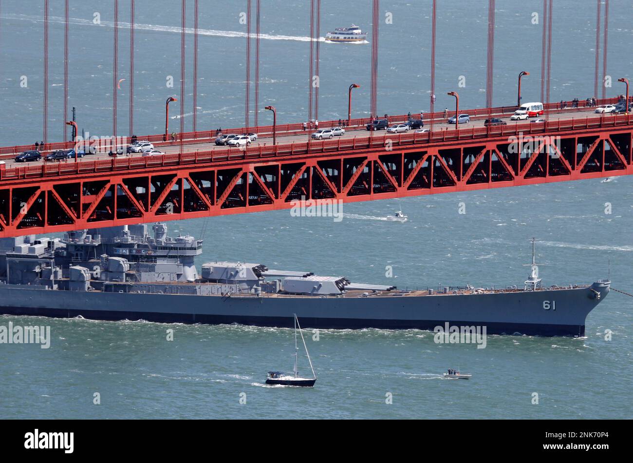 The Iowa approaches the Golden Gate Bridge as it's towed out of San ...