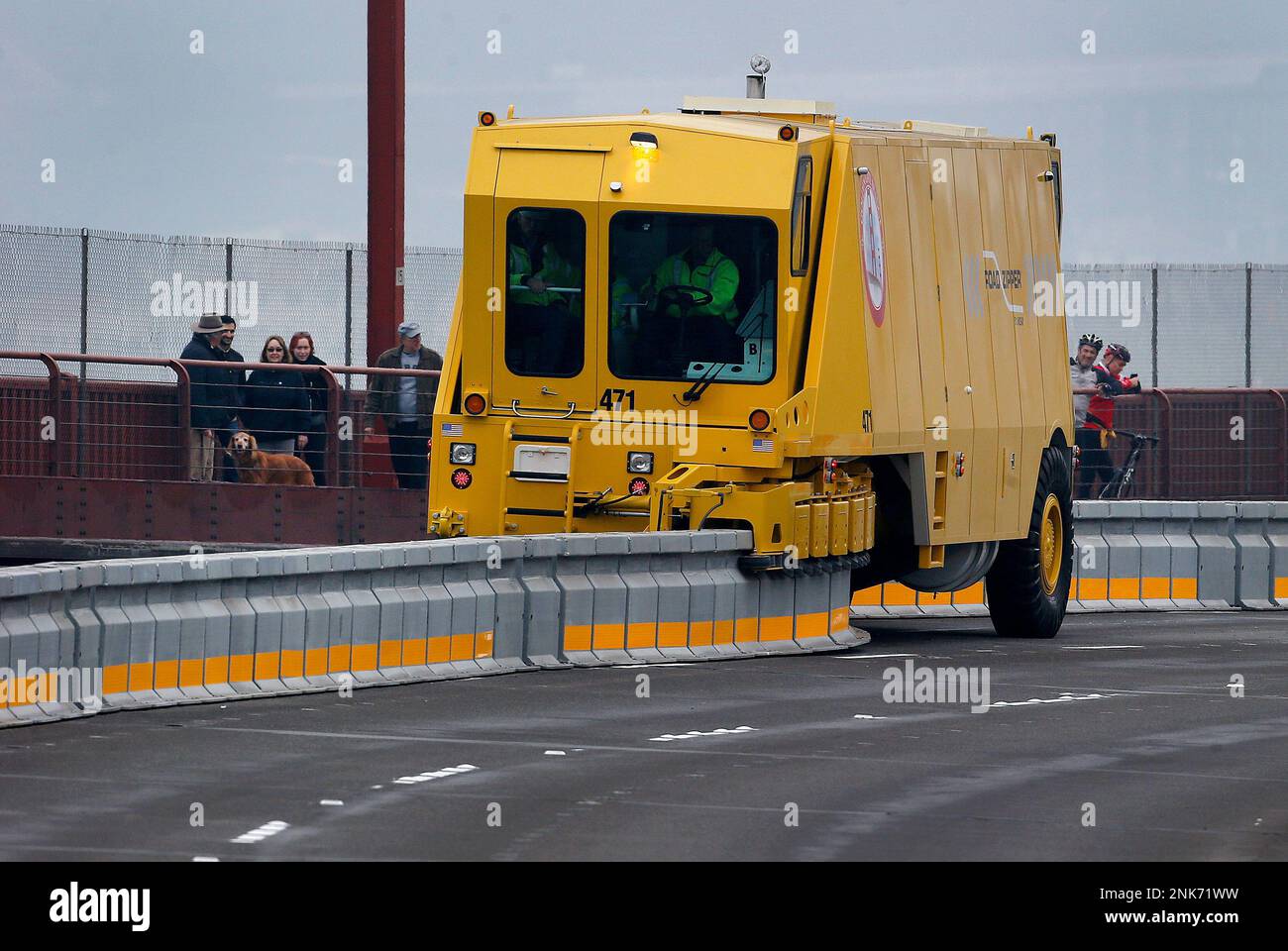 A "zipper" truck brought the median barrier to the center of the ...