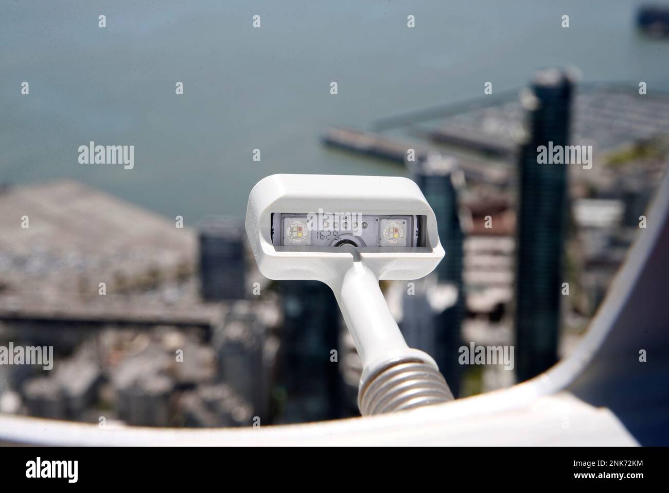 A set of LED lights are visible through large grid panels installed on ...