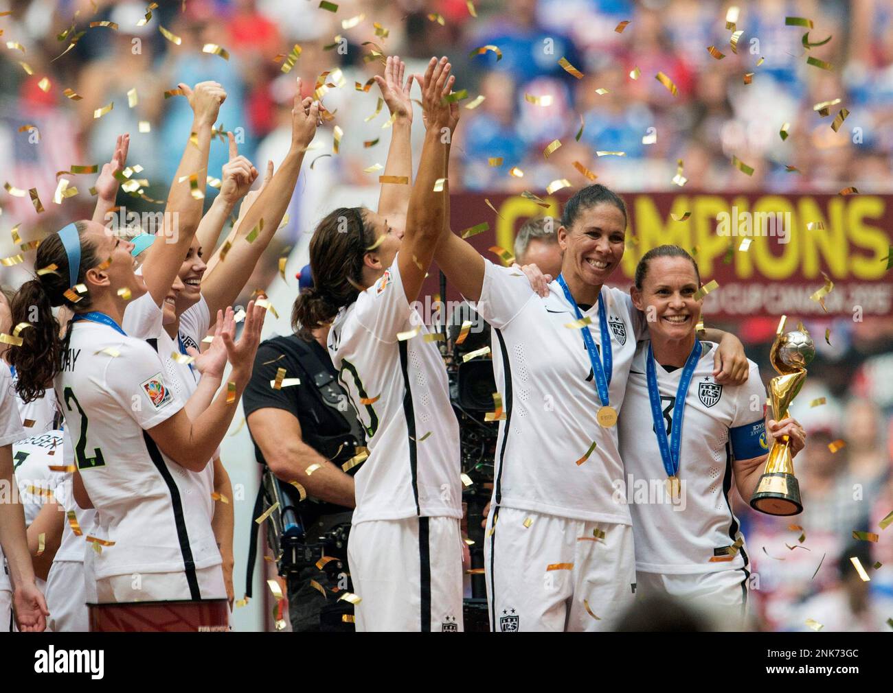 FILE - USA teammates Shannon Boxx, second from right, and Christie ...