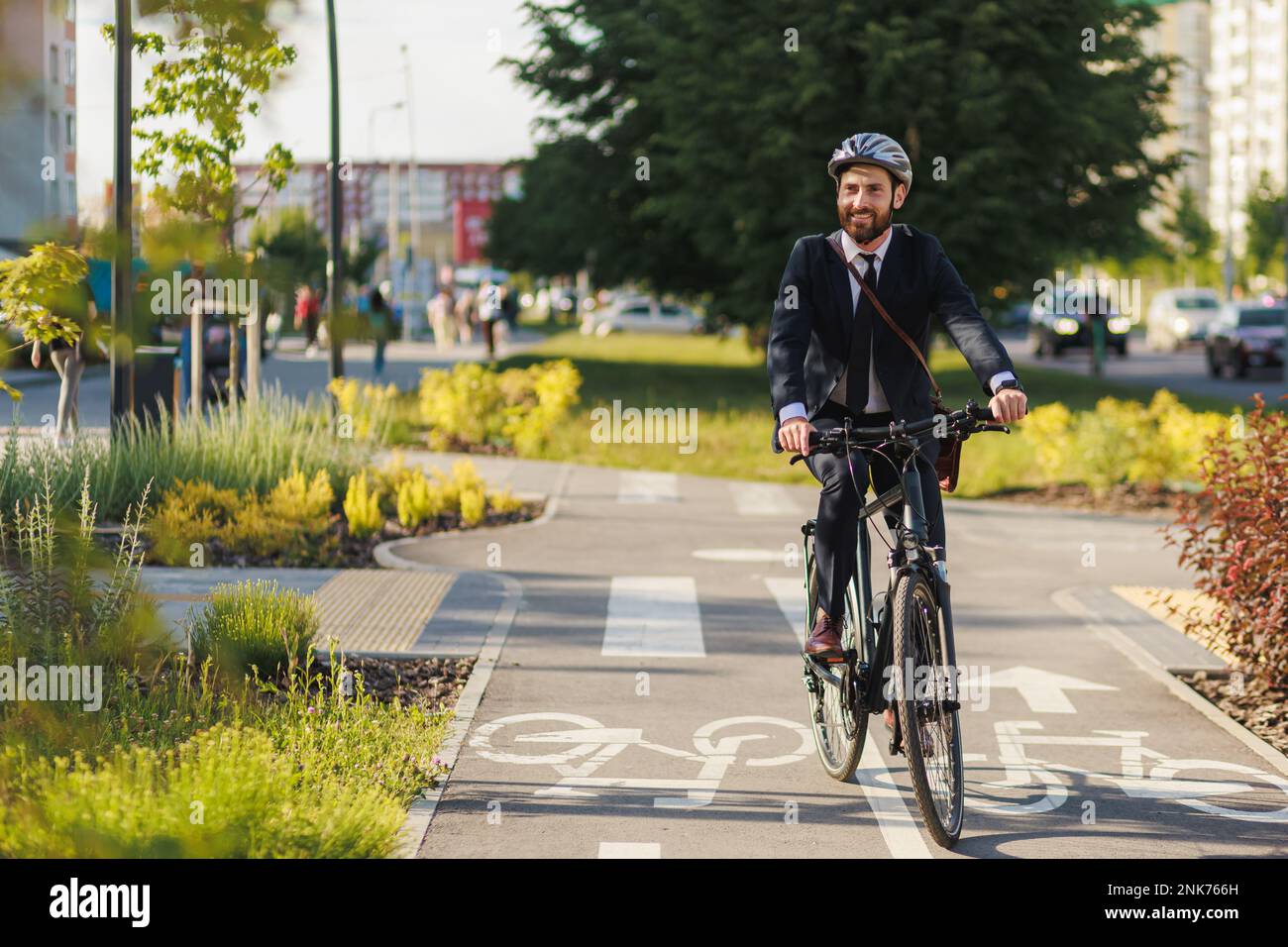 Happy office clerk in smart casual smiling, while riding after work in ...
