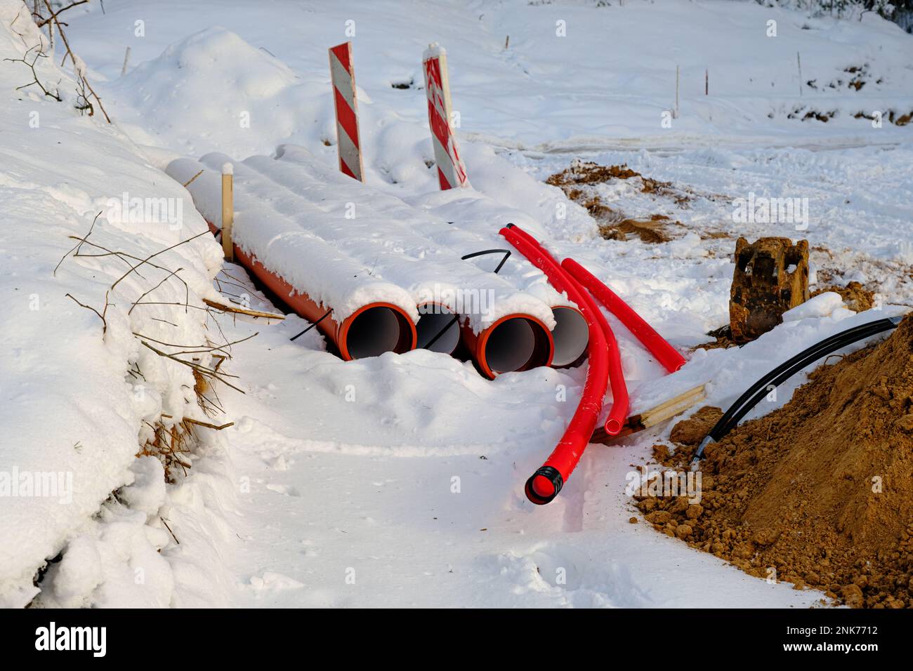 Urgent repairs during the winter. Electric cable replacement. A pile of ...