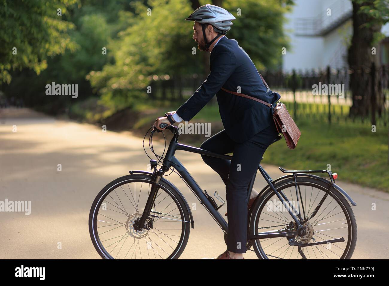 Employee at the park on route to work hi-res stock photography and ...