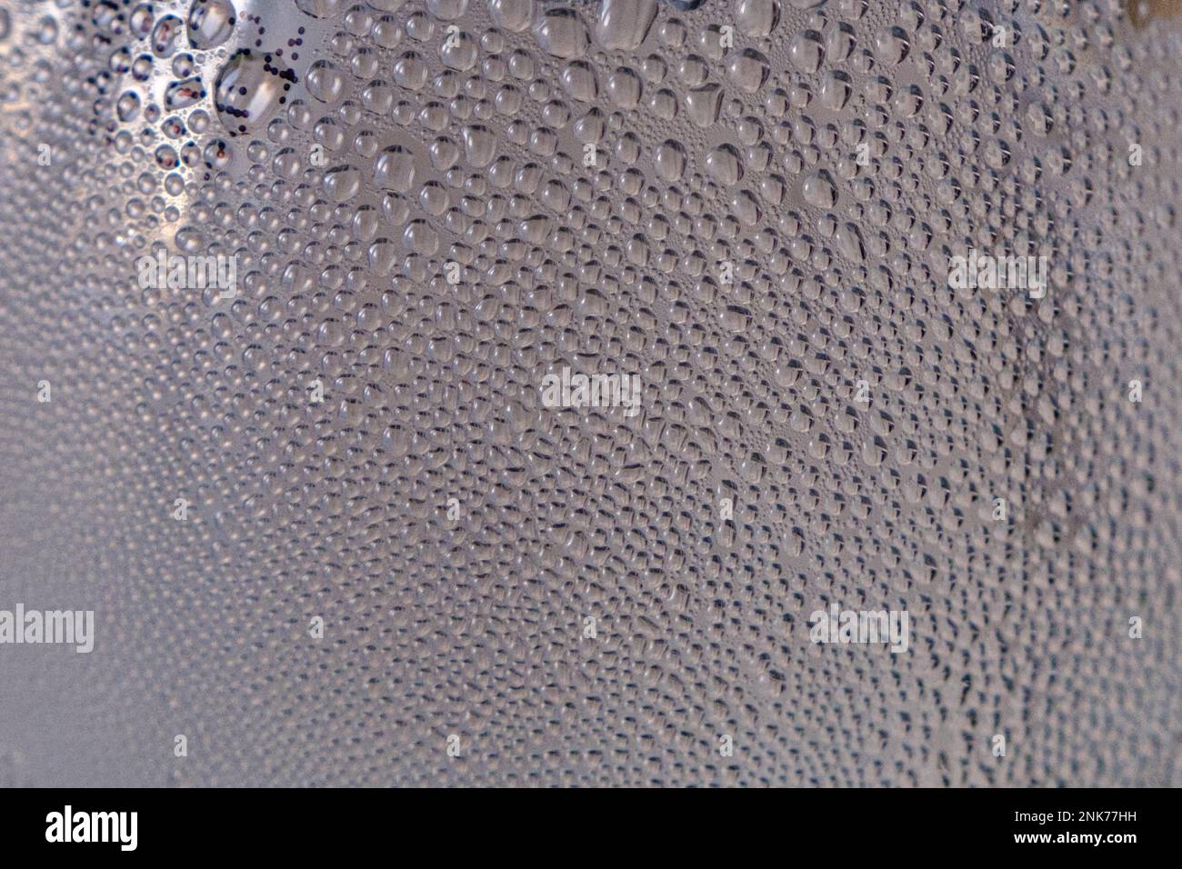 Close up of water drops on a water bottle hi-res stock photography and ...