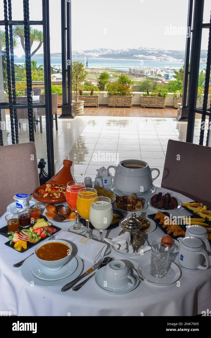 Moroccan breakfast in Ramadan. Harira soup. Dates, tea, juices and ...