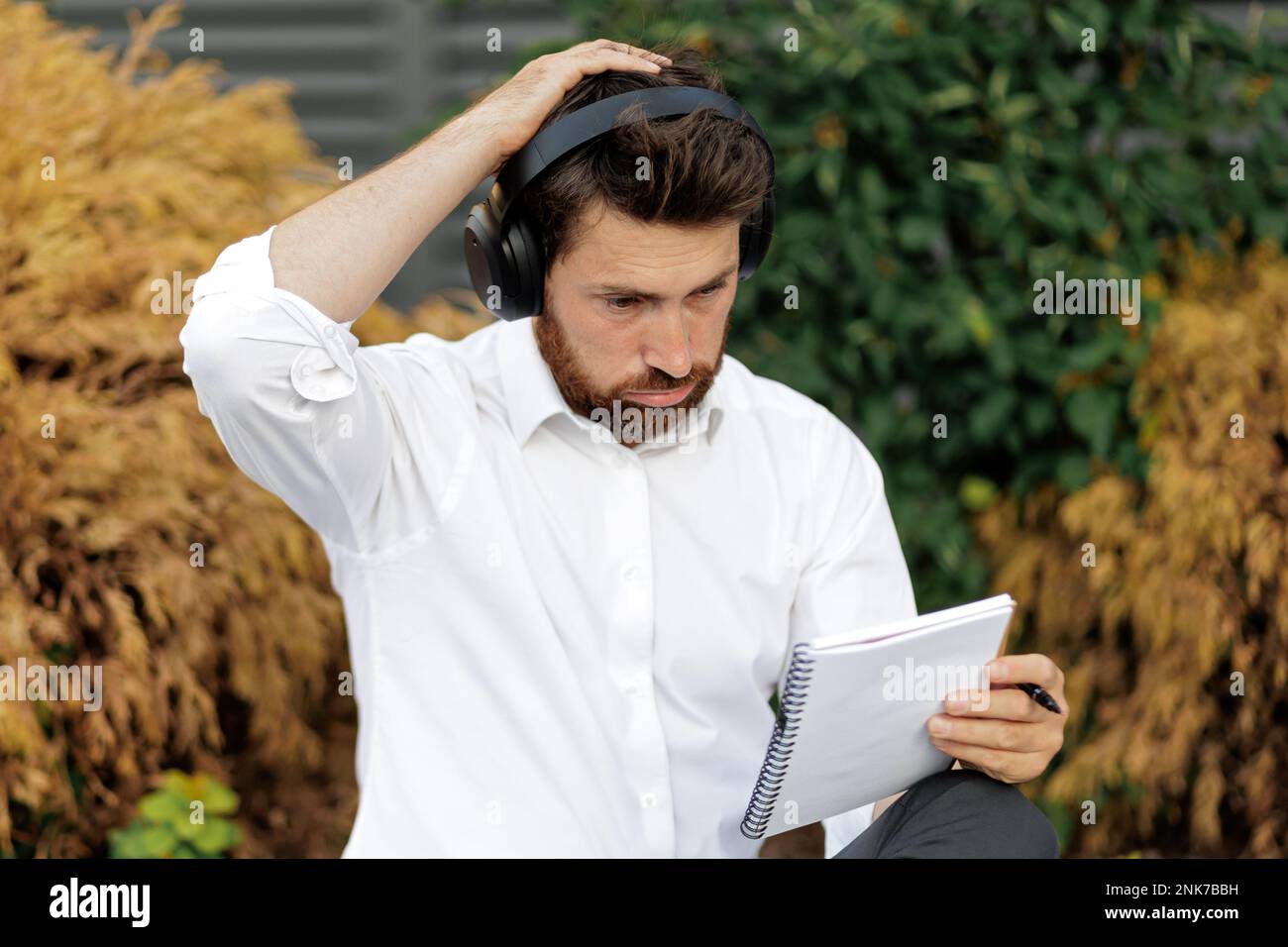 Puzzled businessman scratching head, having hard decision, while ...