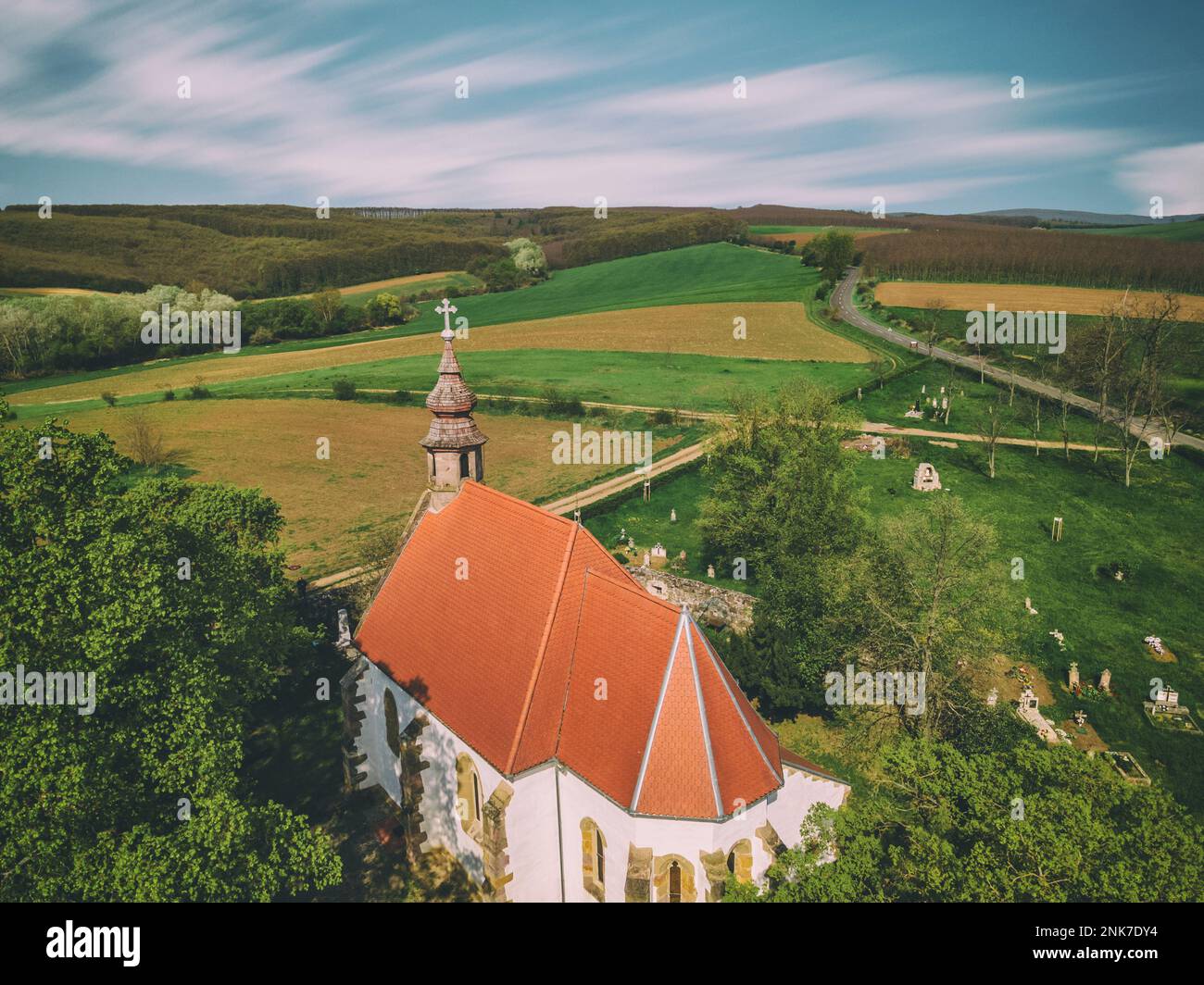 Aerial view of the Roman Catholic church standing alone on the hilltop ...