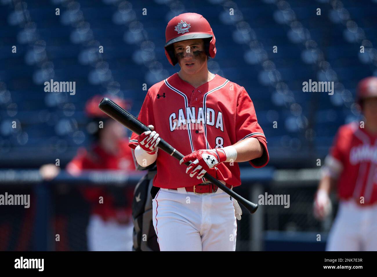 Team Canada outfielder Cameron Chee-Aloy (8) bats during a MiLB ...