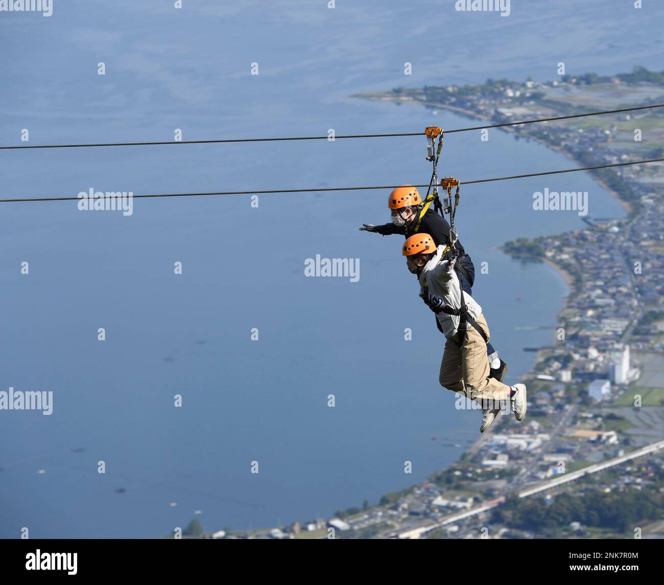 Visitors take part in Zip Line Adventure at Biwako (Lake Biwa) Valley ...