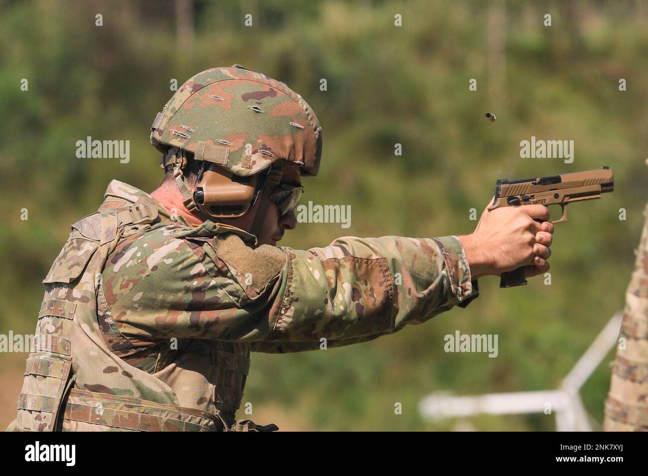 A vermont Army National Guard Soldier fire his M-17 during the ...