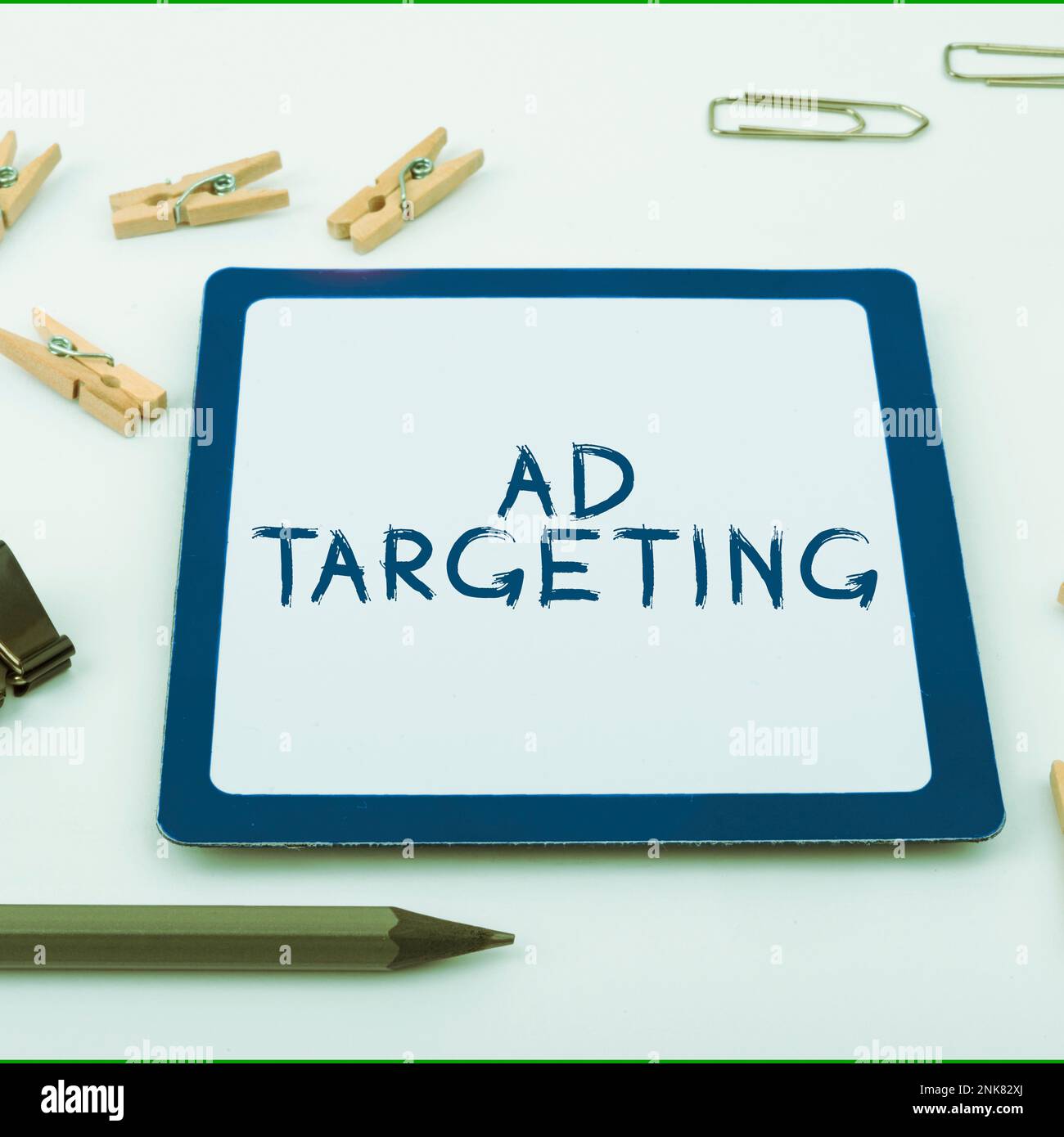 Hand writing sign Ad Targeting. Business overview target the most ...