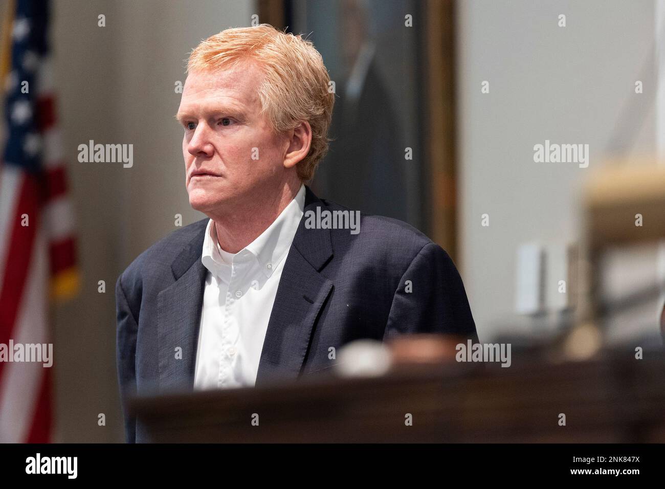 Alex Murdaugh stands next to the witness booth during a break in his ...