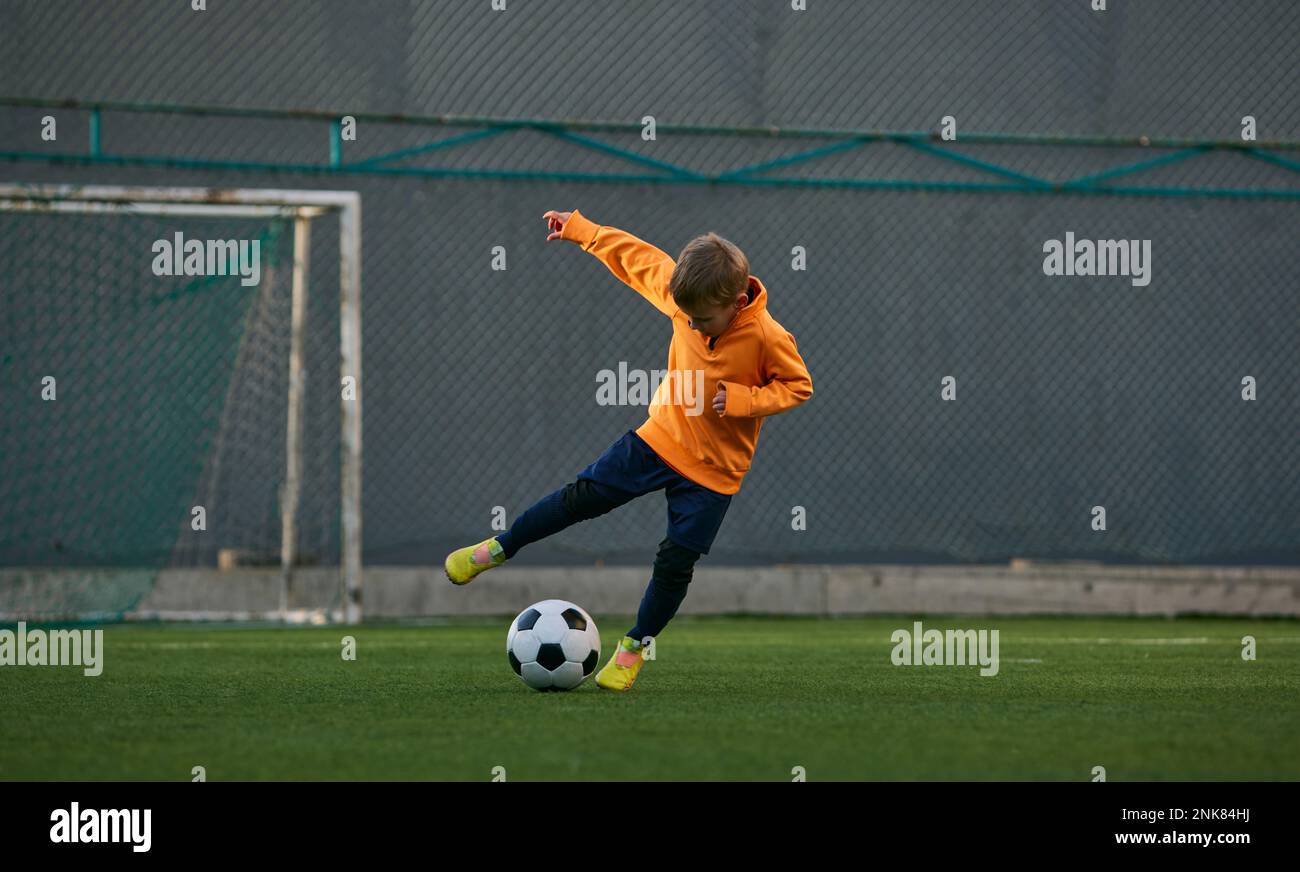 Goalkeeper position. Little boy, child, football player in uniforma ...