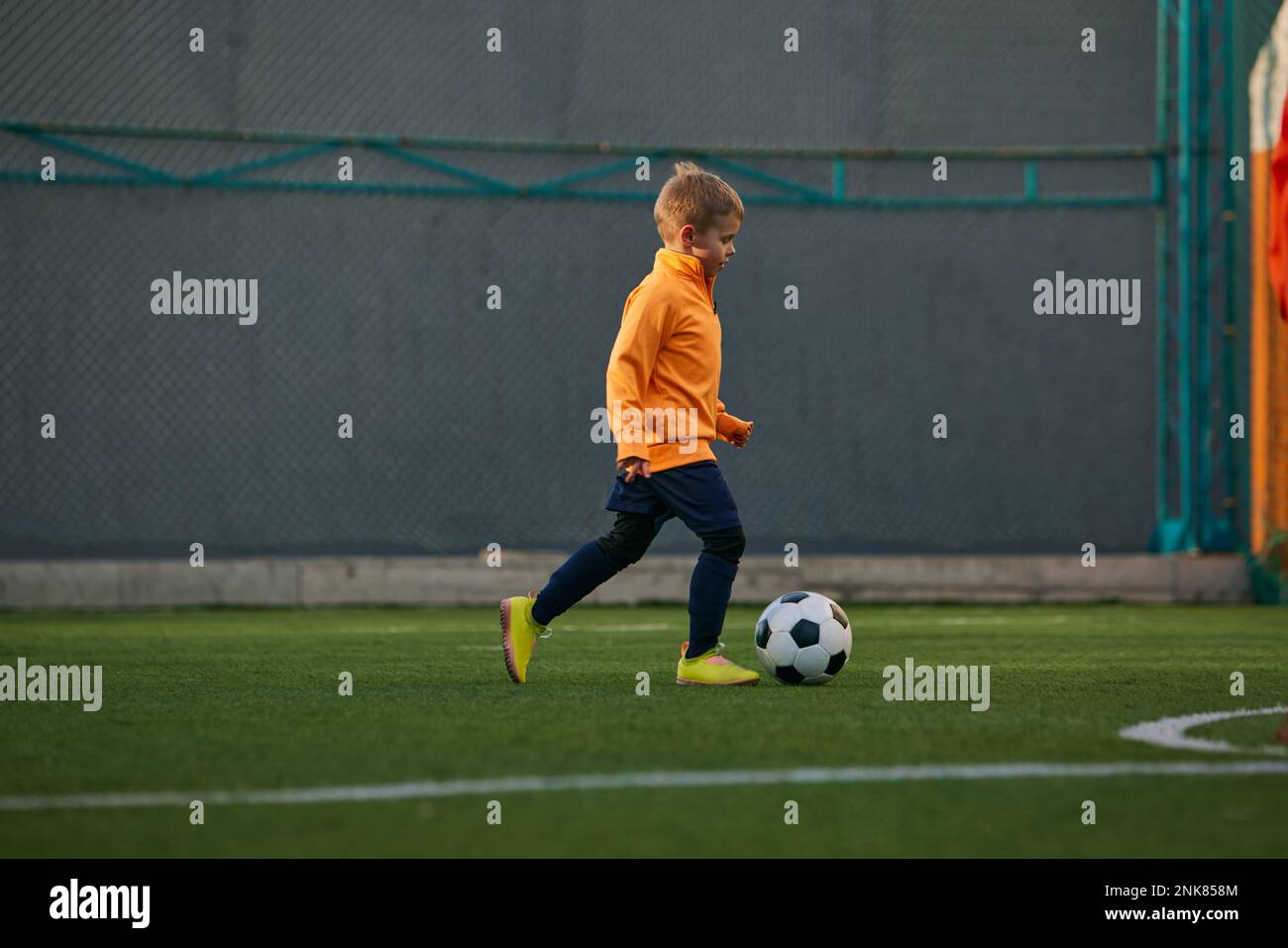 Goalkeeper position. Little boy, child, football player in uniforma ...