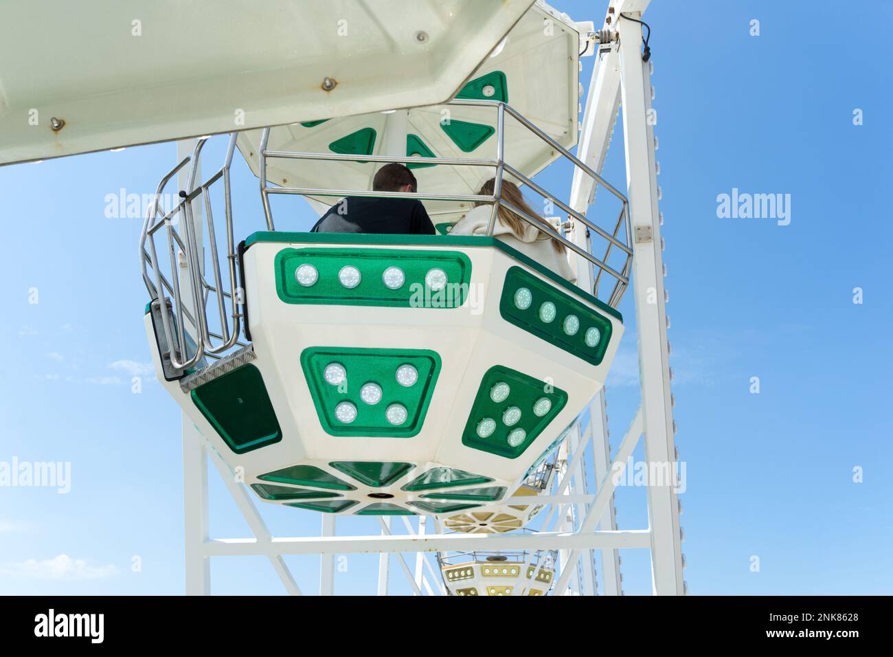 Ferris wheel in front of a clear blue sky on the beach of Kuehlungsborn ...