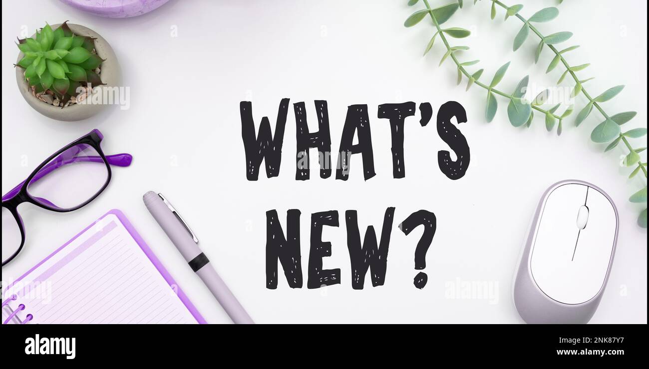 Sign displaying What's New. Word Written on Asking about latest Updates ...