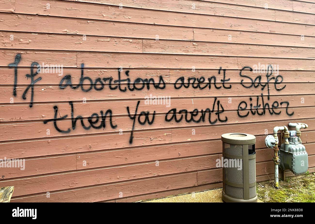 Threatening graffiti is seen on the exterior of Wisconsin Family Action ...