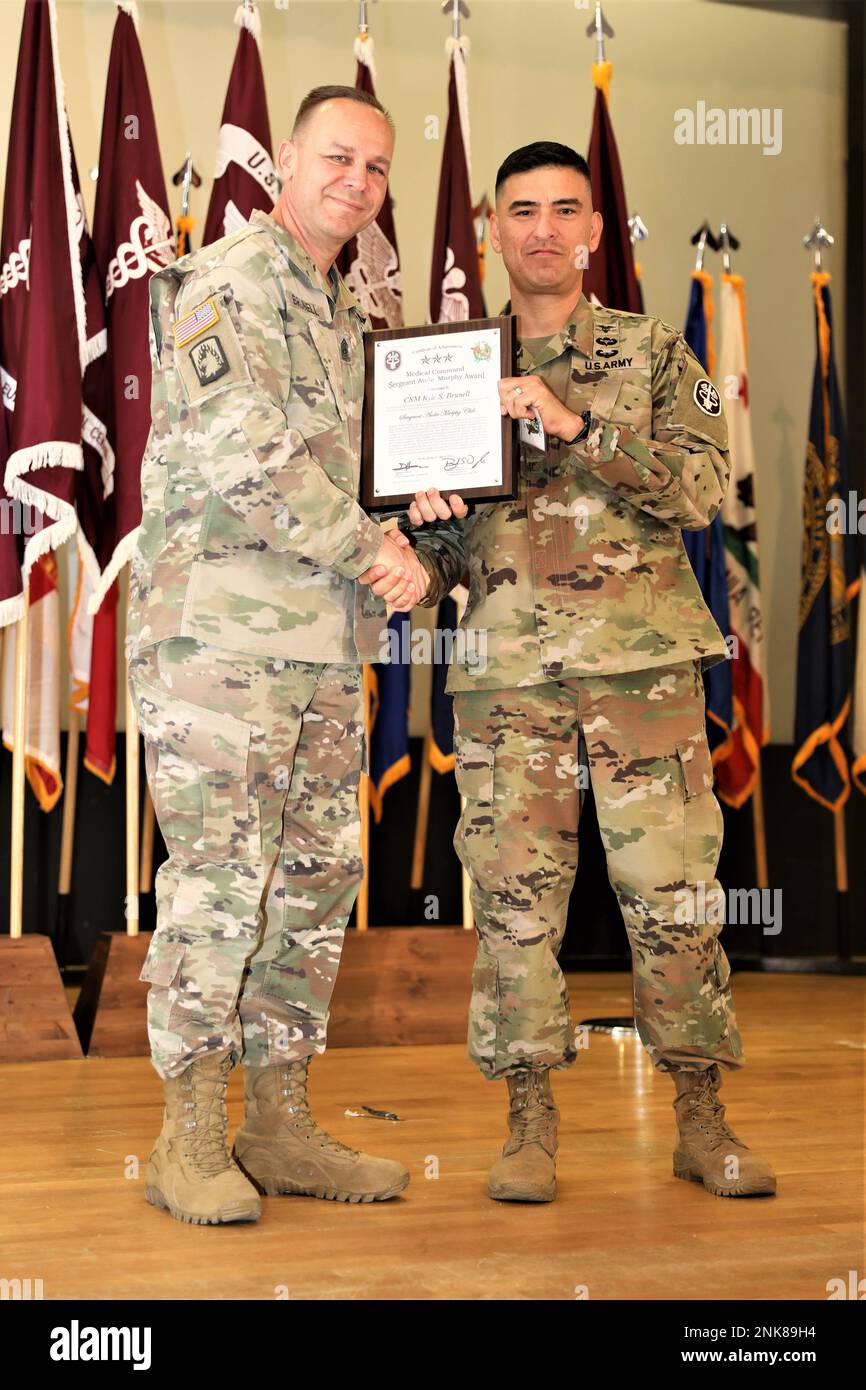 Command Sgt. Maj. Kyle Brunell (left) pictured with Command Sgt. Maj ...
