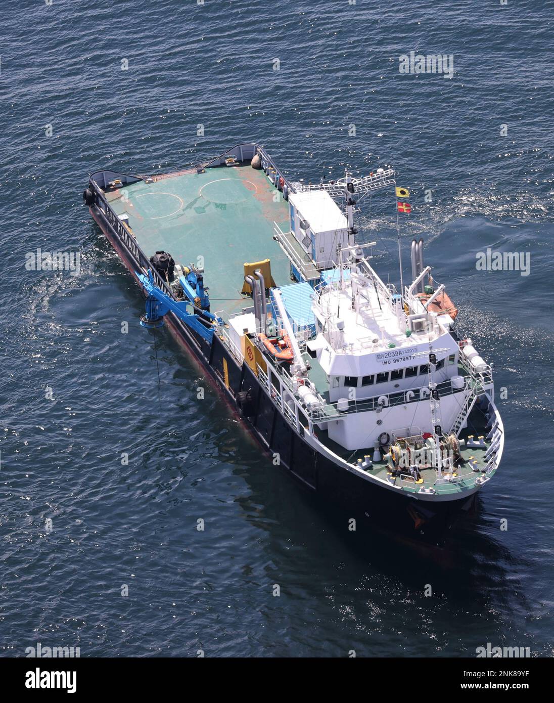 A vessel Shinnichimaru of Fukada Salvage & Marine Works serches for ...