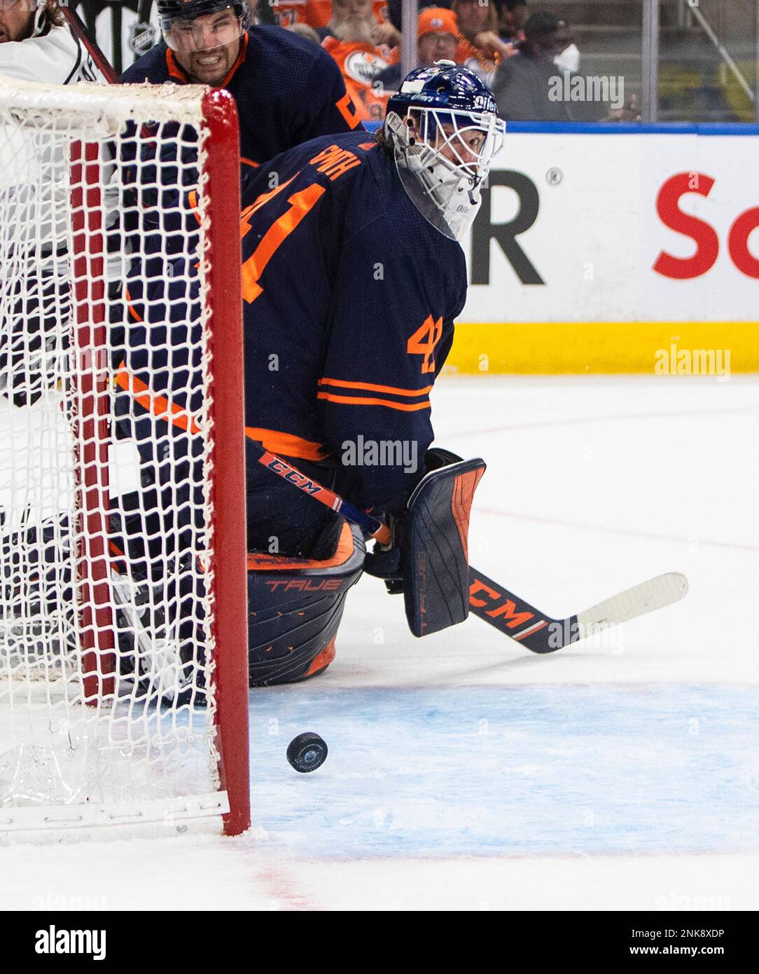 Edmonton Oilers goalie Mike Smith (41) looks as the puck is almost ...