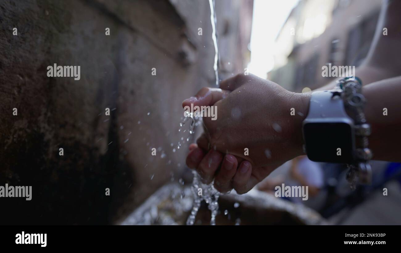 Washing hands outdoor tap woman hi-res stock photography and images - Alamy
