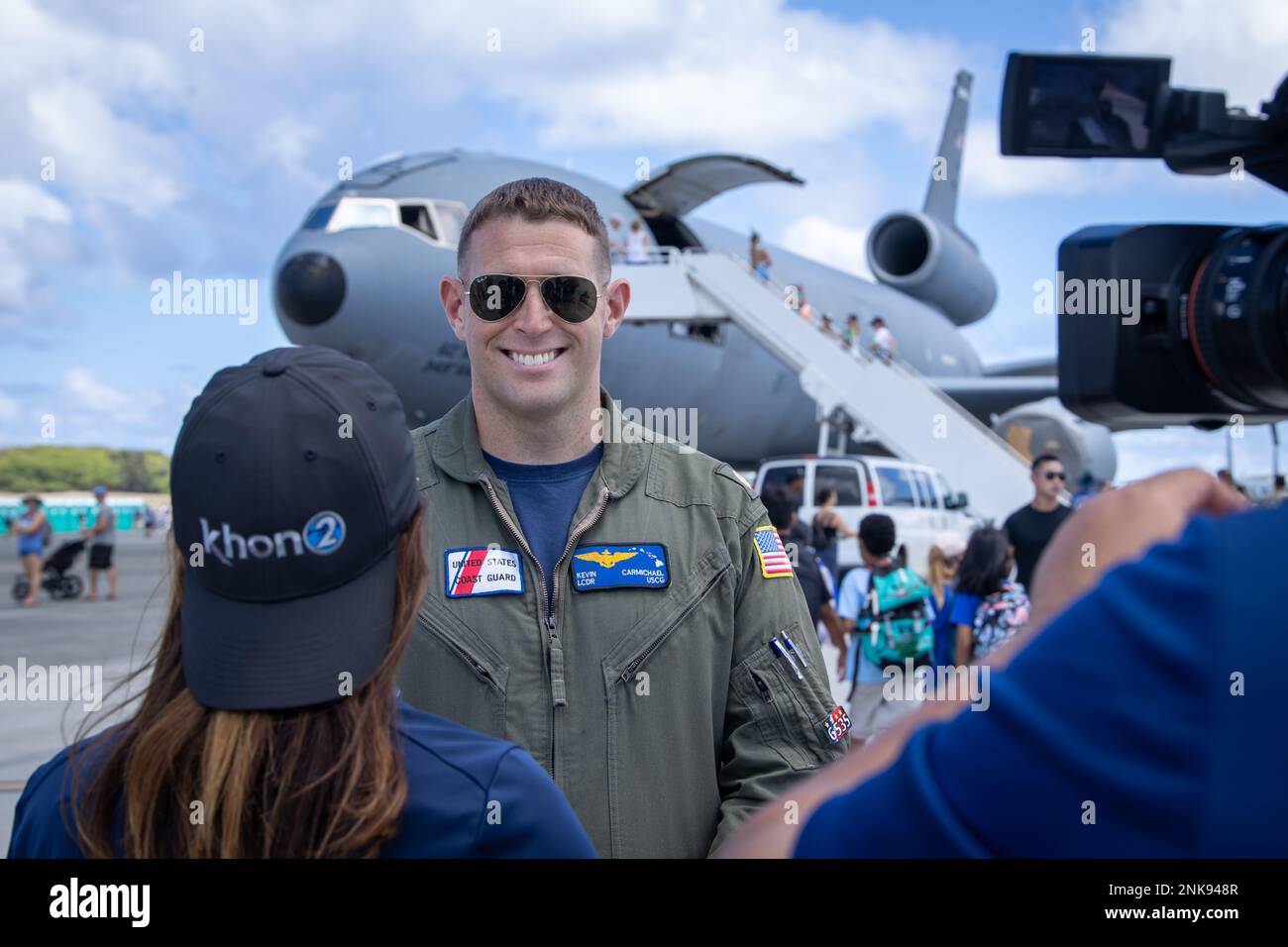 U.S. Coast Guard LCDR Kevin Carmichael conducts an interview with KHON ...