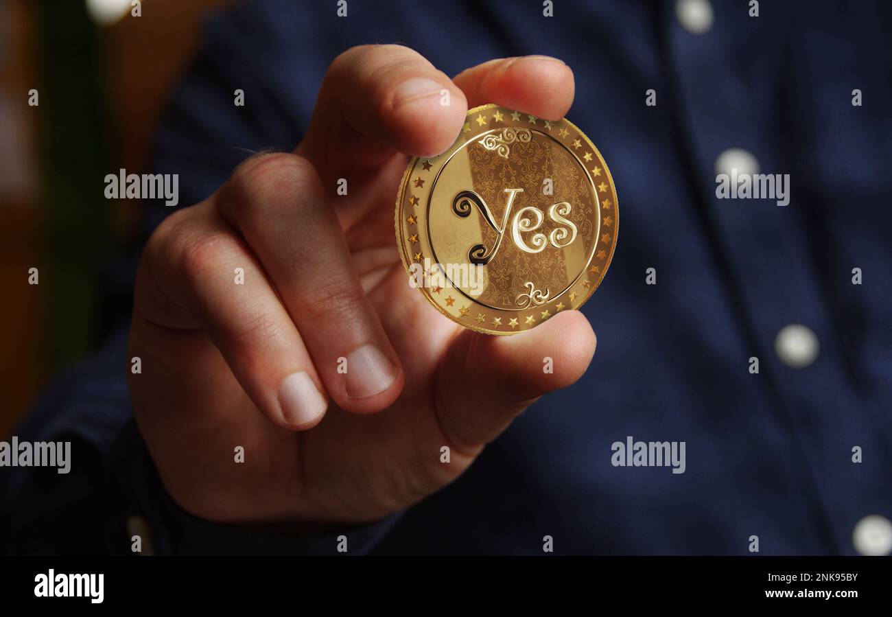 Yes or No random decision choice and gamble golden coin in hand ...