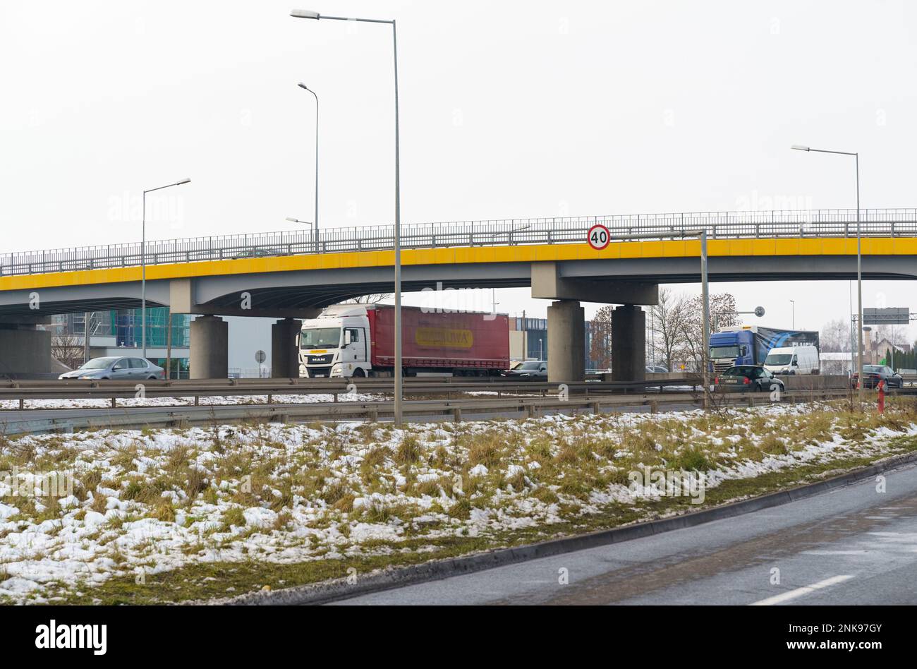 Poznan, Poland - January 24, 2023: Car traffic on a motorway under an ...