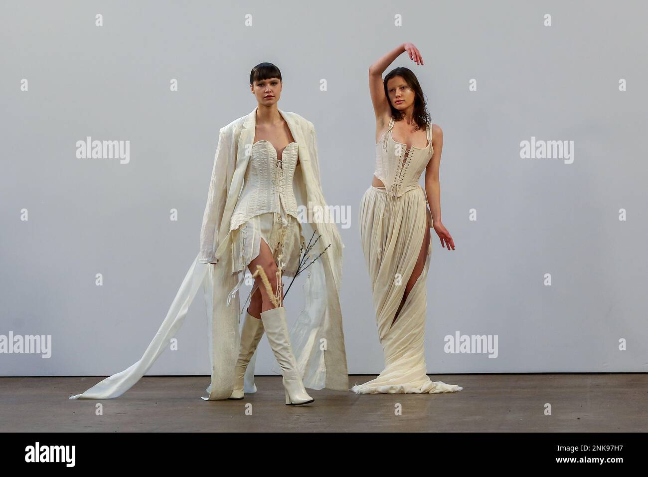 London, UK. 18th Feb, 2023. Models walk the runway at the Gyouree Kim ...
