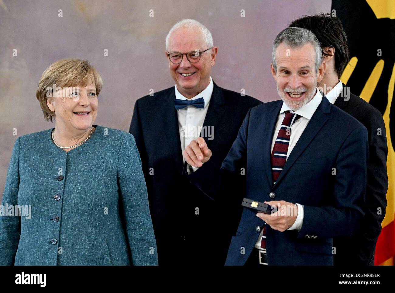 Former German Chancellor Angela Merkel, from left, Jean-Claude Kuner ...