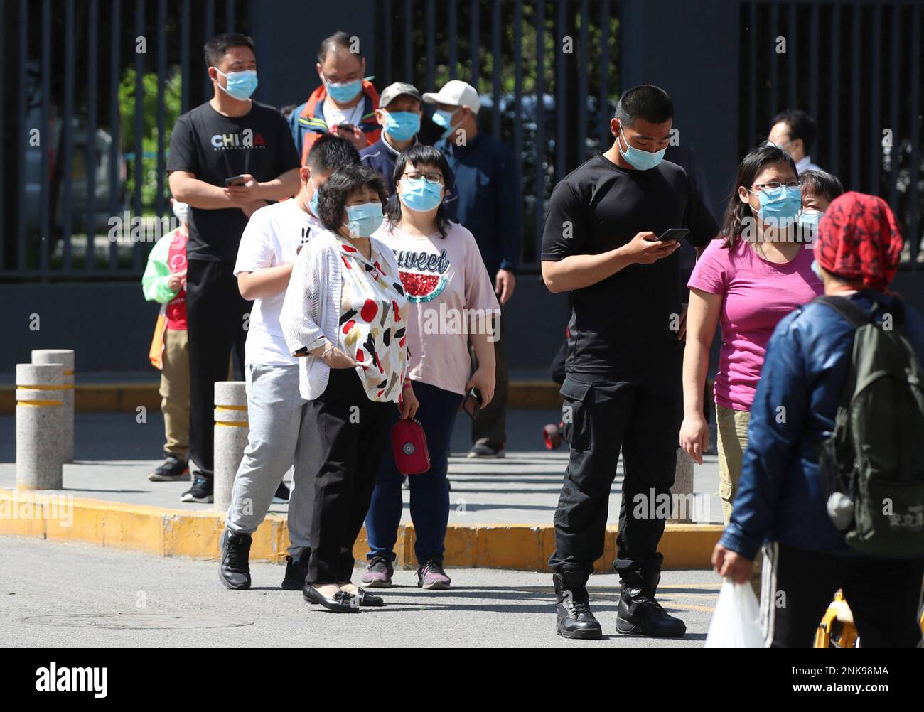 People line to take PCR tests in Dongcheng District, Beijing, China on ...