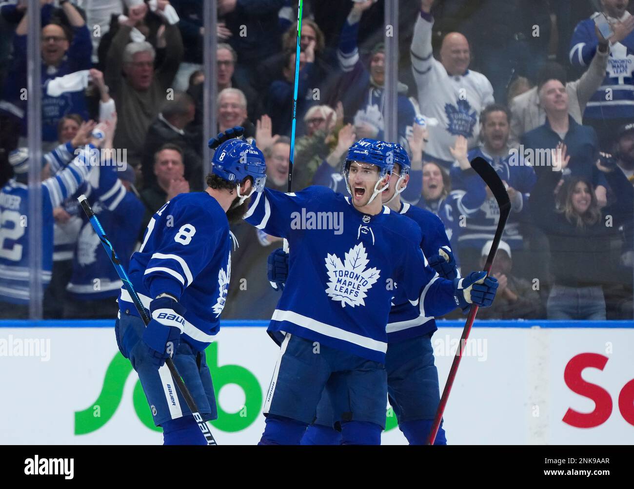 Toronto Maple Leafs defenseman Jake Muzzin (8) celebrates his goal with ...