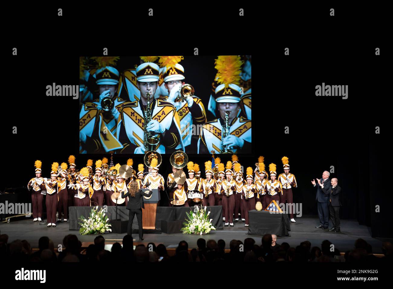 Gov. Tim Walz, second from right, and marching band instructor Skeeter ...
