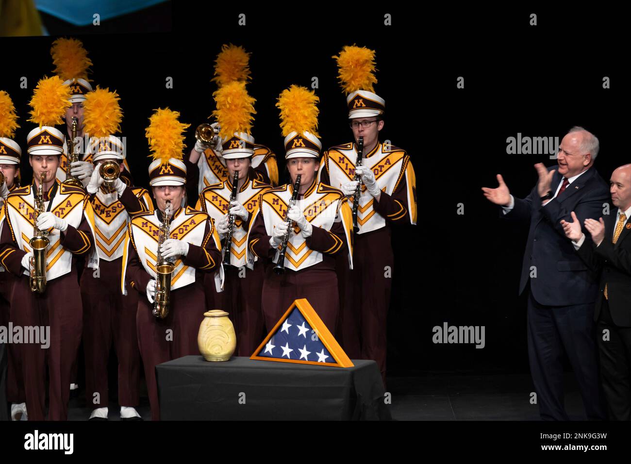 Gov. Tim Walz, second from right, and marching band instructor Skeeter ...