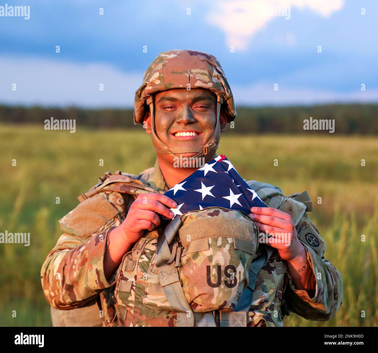 Specialist Angel Monge, a Paratrooper assigned to Headquarters and ...
