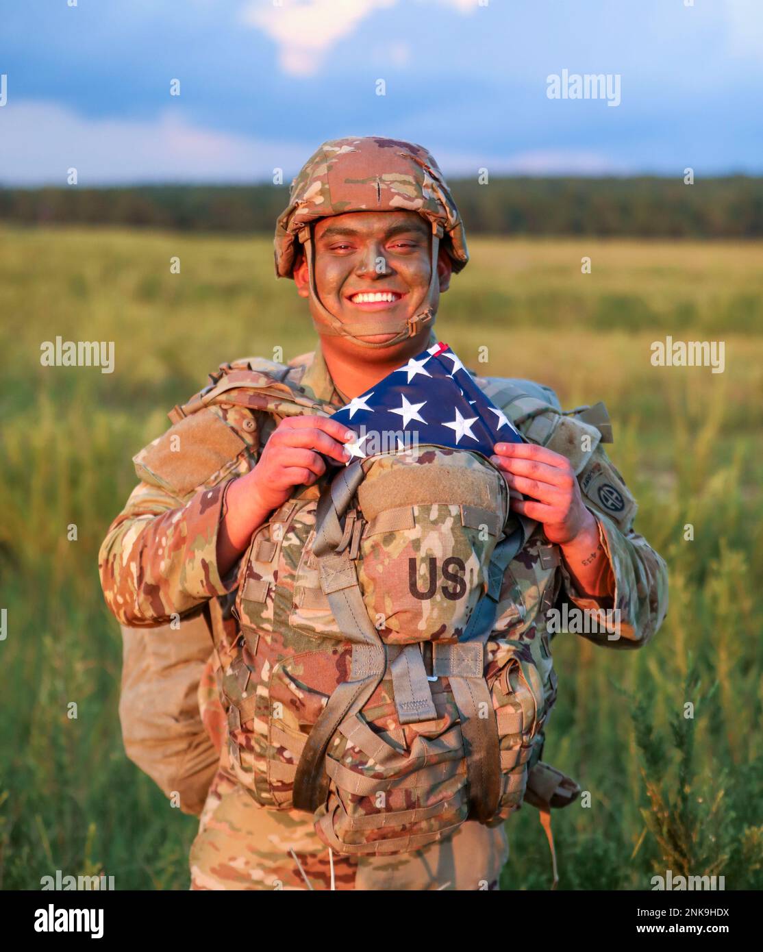Specialist Angel Monge, a Paratrooper assigned to Headquarters and ...