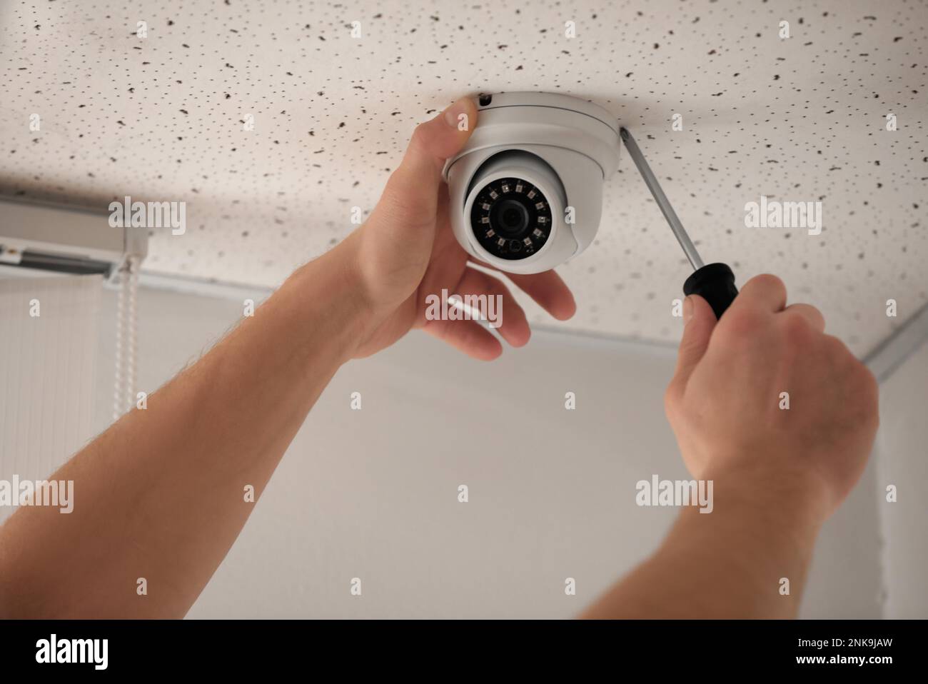 Security camera setup, cctv installation Stock Photo - Alamy