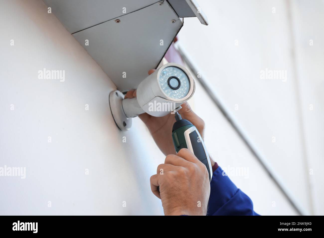 Security camera setup, cctv installation Stock Photo - Alamy
