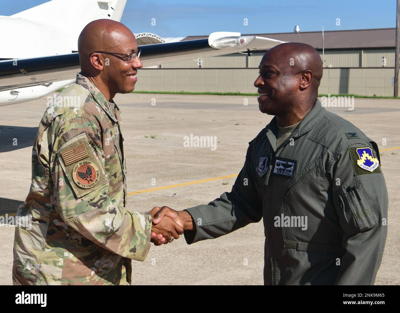 Air Force Chief of Staff Gen. CQ Brown, Jr. is greeted by Col. Henry ...