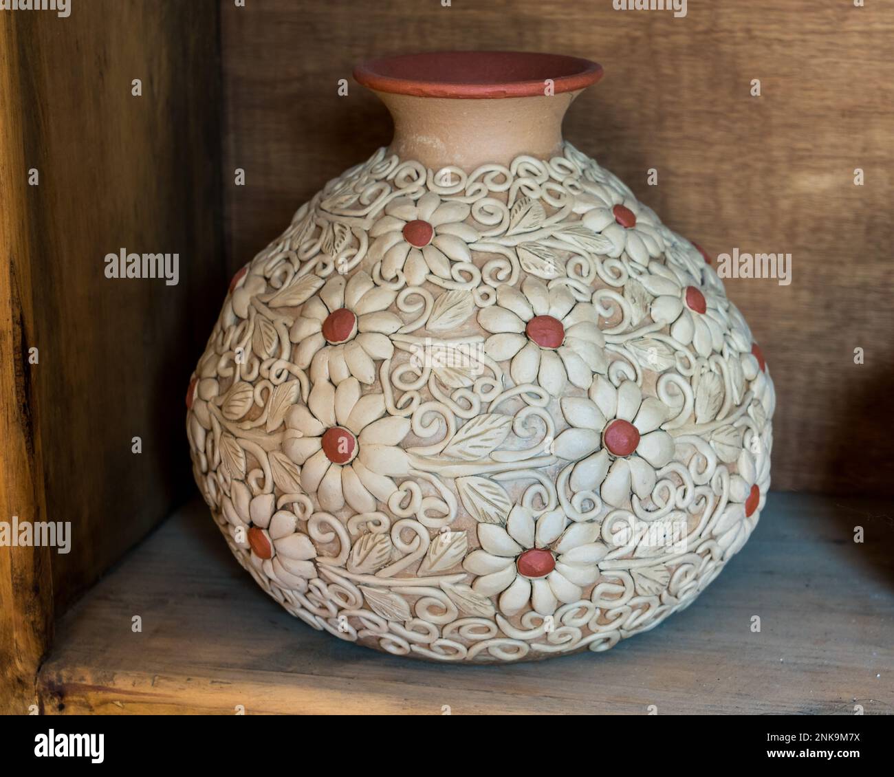 A pot with floral motif for sale in the ceramic workshop of the Teodora ...