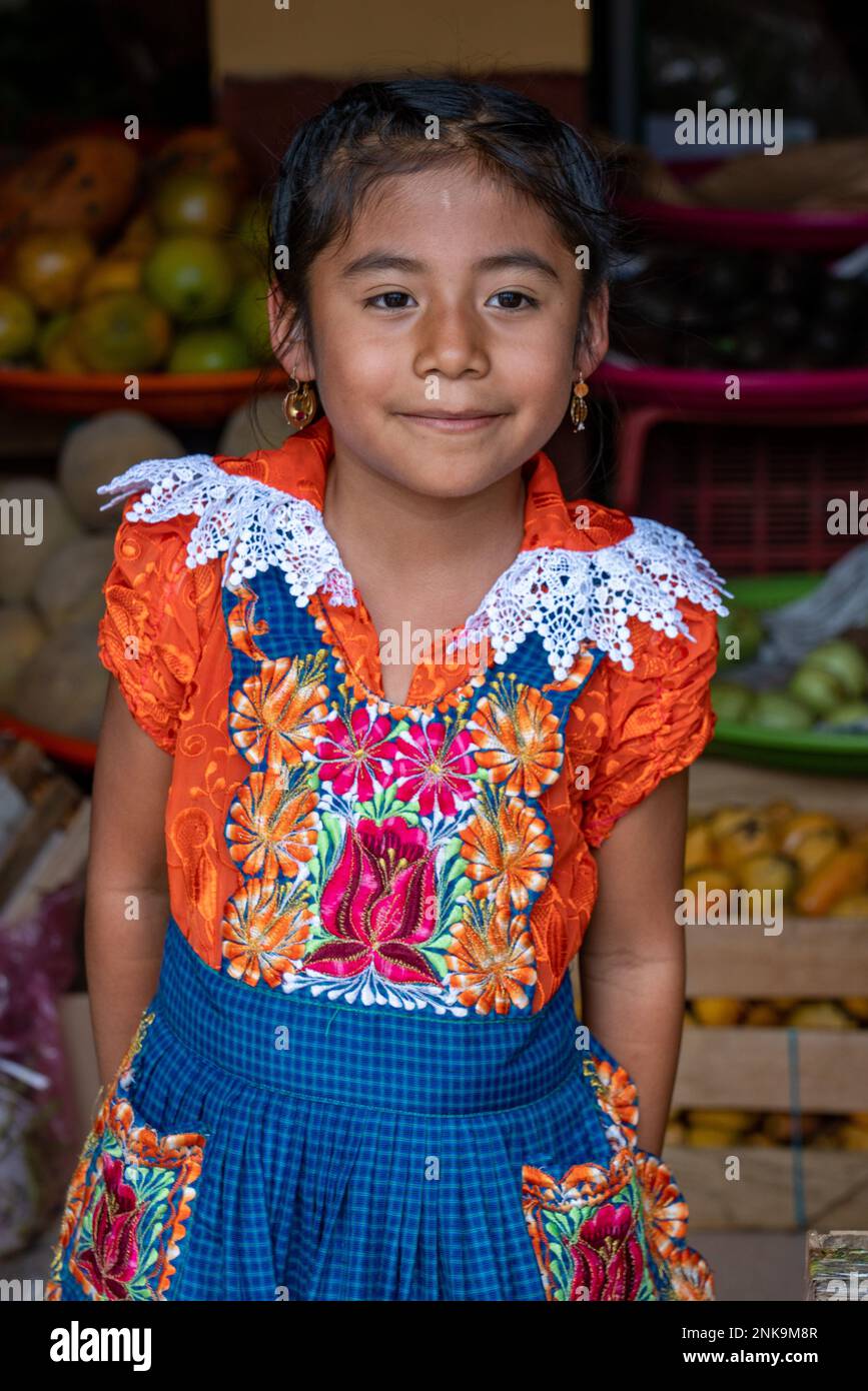 Portrait of an indigenous Zapotec girl in traditional dress of ...