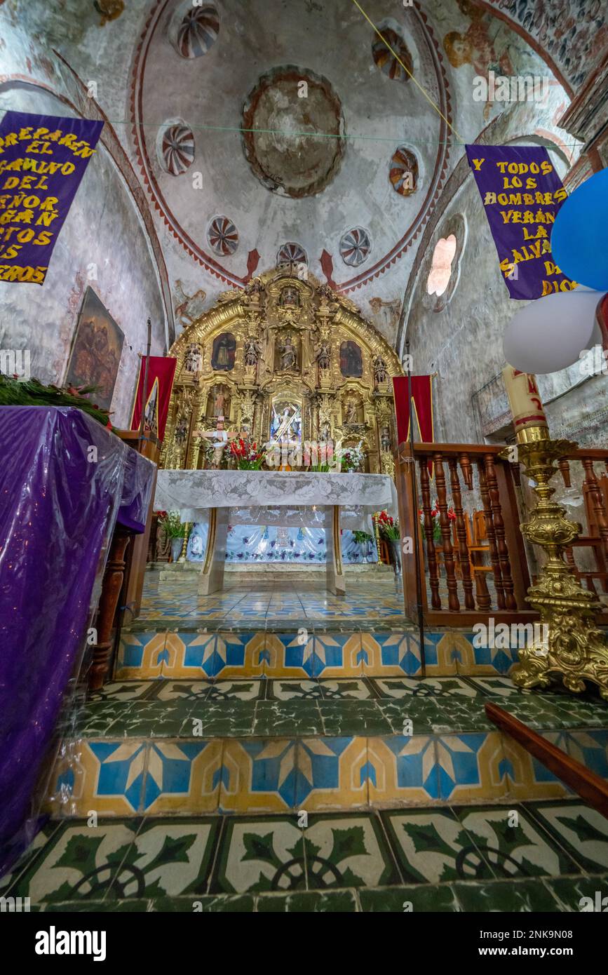 The elaborate gilded altarpeice or retablo of the Spanish colonial ...